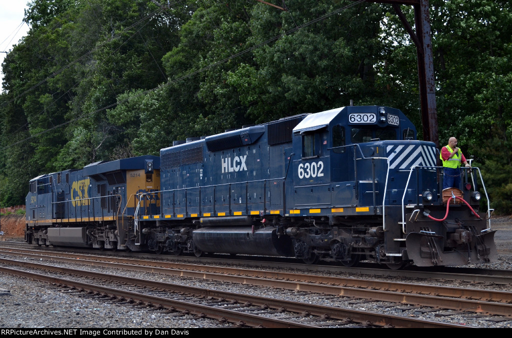 HLCX SD40-2 6302 trails on Q300-26